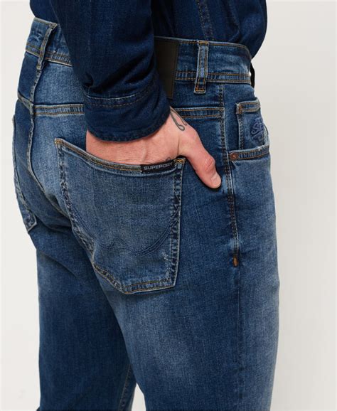 Mens Skinny Jeans In Bay Mid Blue Superdry Uk