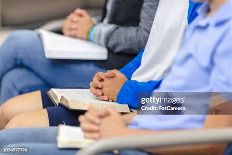 Praying Together In Class Photos And Premium High Res Pictures Getty