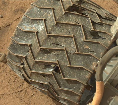 The Curiosity Rovers Wheels After Almost A Decade On The Rugged