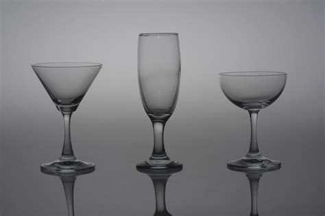 Premium Photo Drinking Glasses On Grey Background