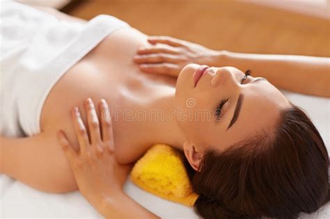 Spa Massage Beautiful Woman Gets Spa Treatment In Salon Stock Image