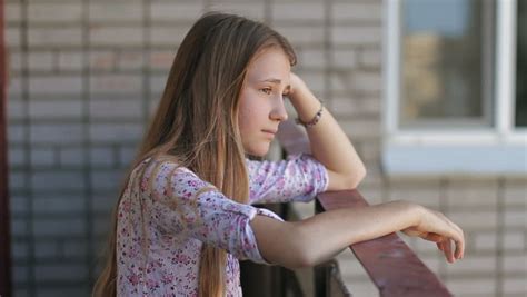 Depressed Teenage Girl Silhouette Of Young Woman In Despair Standing