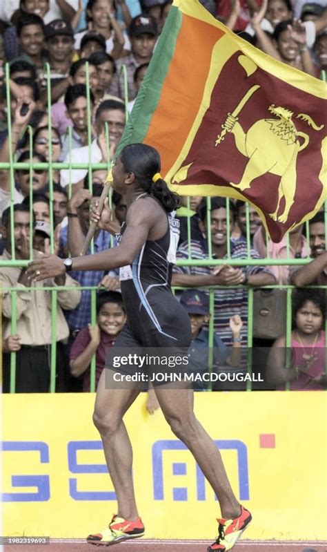 Sri Lankas Susanthika Jayasinghe Is Cheered By The Crowd During Her News Photo Getty Images