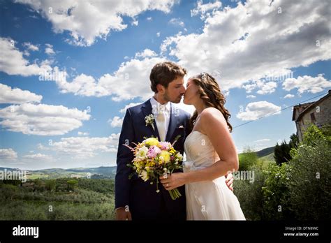 Bride And Groom Kissing Stock Photo Alamy
