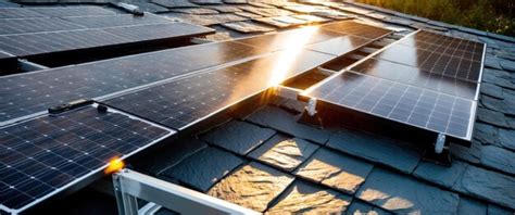 a close up of a solar panel array capturing sunlight on a rooftop