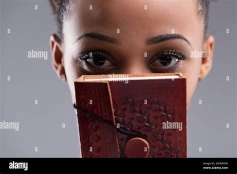 Young Readers Eyes Tell A Tale Above The Book Shes Engrossed In