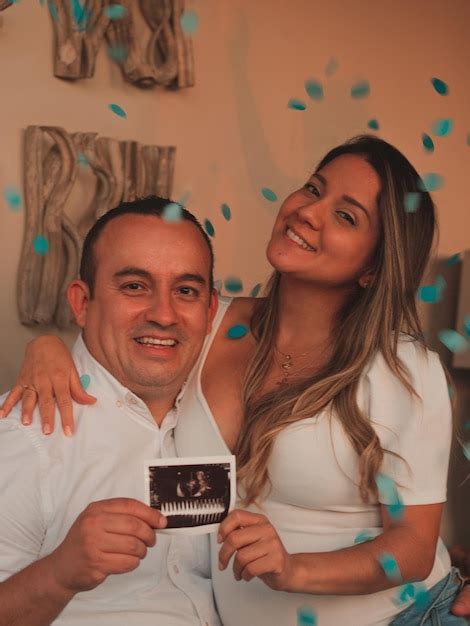 Premium Photo Beautiful Married Couple Revealing The Sex Of Their Baby