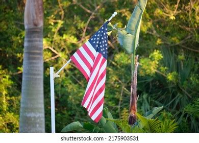 American Flag Waving On Corner Private Stock Photo 2175903531