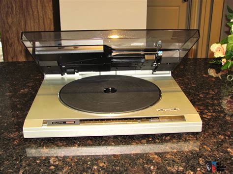 Vintage Technics SL QL Quartz Lock Direct Drive Linear Tracking Turntable Photo