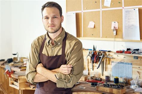 Premium Photo Young Man In Workshop