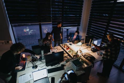 High Angle Photo Of Business People Collaborating On Documentation And