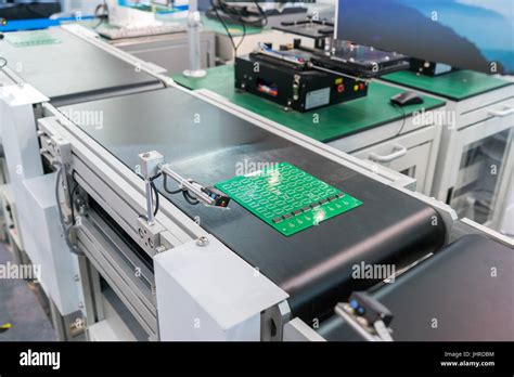 PCB Processing On CNC Machine Production Of Electronic Components At High Tech Factory Stock