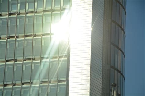 Premium Photo Sunlight Shining On Glass Building