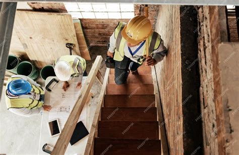 Premium Photo Top View Construction And Steps With Builder Engineer