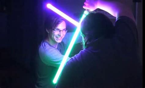 Charlie Slimecicle Smiling While In A Lightsaber Fight With