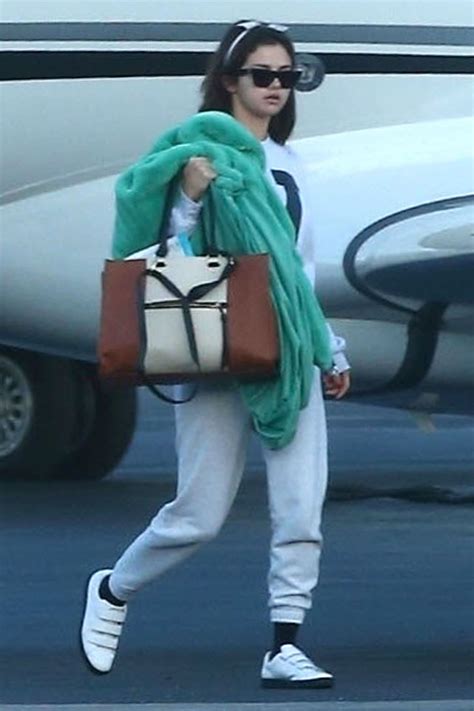Selena Gomez Arrives At A Private Jet In Los Angeles
