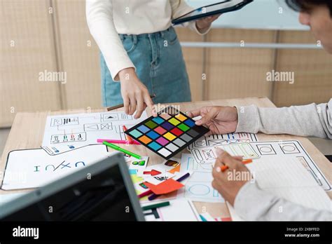 Creative Ux Ui Design Process With Color Palette And Wireframes On Desk Designers Collaboration