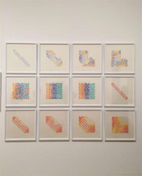 Nine Squares Are Arranged On The Wall In Different Sizes And Colors Each With An Individual S