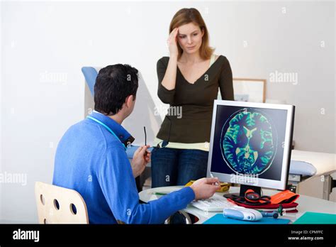 NEUROLOGY CONSULTATION WOMAN Stock Photo Alamy