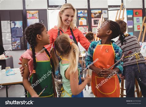 Student And Teacher Interacting Over 5865 Royalty Free Licensable