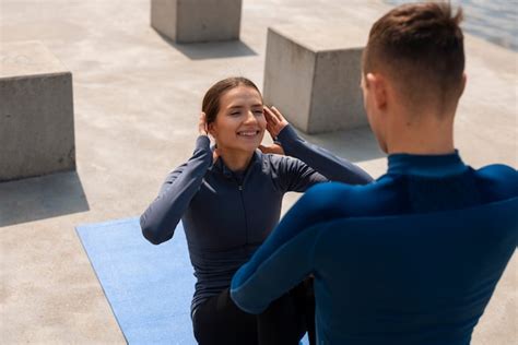 Free Photo High Angle Couple Doing Workout Exercises