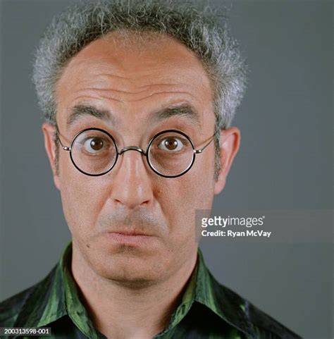 Man Wearing Round Glasses Photos And Premium High Res Pictures Getty