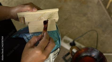 Batik application on accessories box decoration with wood material ...
