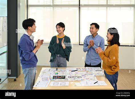 Team Of Creative People Brainstorming And Discussing For Mobile Application Software Design