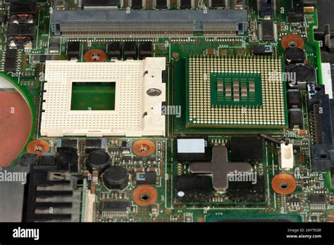 Close Up Of Laptop Processor With Empty Socket Base For Cpu On Main