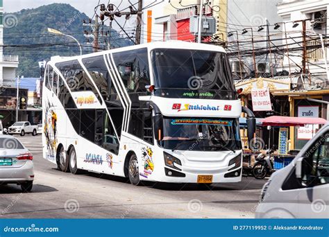 White Scania Bus On The Road In The City With Traffic Editorial