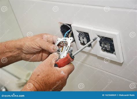 Electrican Repair And Installing Socket Outlet Plug Stock Image Image Of Worker Male