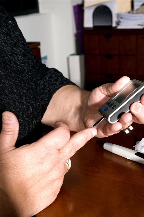 Free Picture Patient Read Blood Glucose Level Electronic Glucose Meter