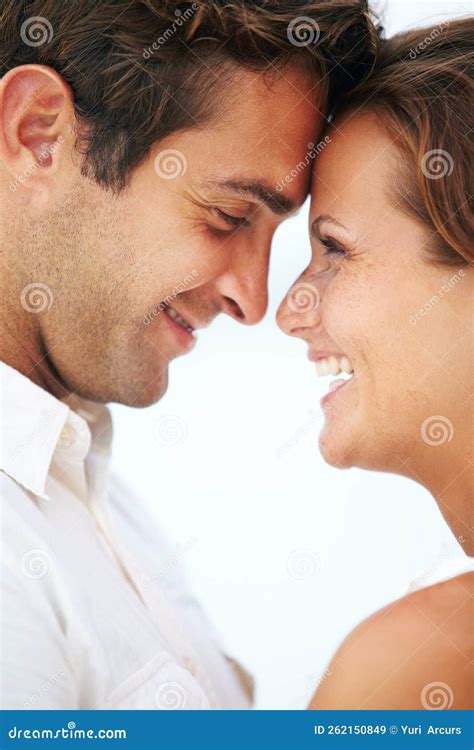 A Light Moment Between Lovers A Young Couple Laughing Playfully As