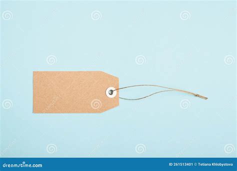 Blank Paper Price Tag With A Knotted String On A Blue Stock Image Image Of Paper Empty 261513401