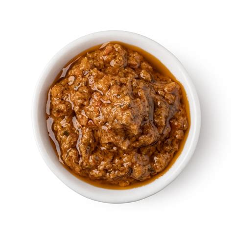 Premium Photo Bowl With Red Pesto Sauce