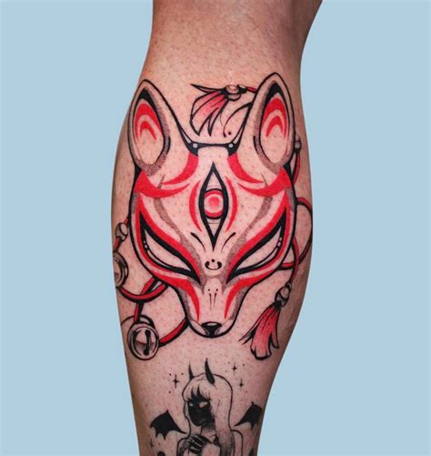 Kitsune Mask Tattoo Located On The Calf