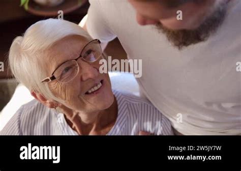 Closeup Portrait Old Mature 60s Mom Talking With Young Adult Man Grown