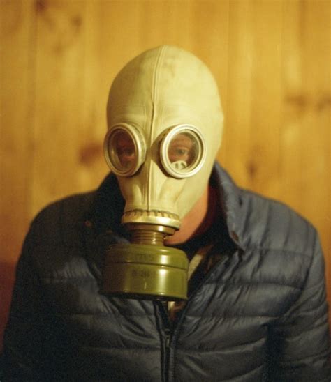 Premium Photo Close Up Of Man Wearing Gas Mask