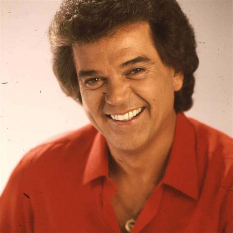 Download Conway Twitty Smiling Portrait1980s Wallpaper