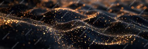Sparkling Golden Particles On A Dark Surface Forming Undulating