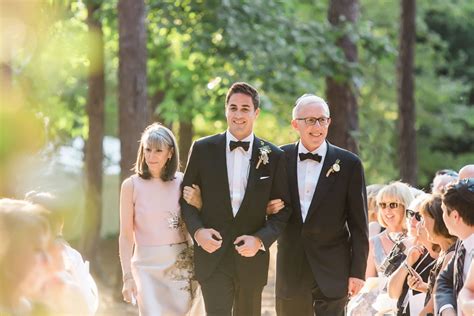 Groom Walking Down Aisle With Mom Dad