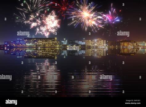 Beautiful Happy New Year Fireworks Above A City Skyline With