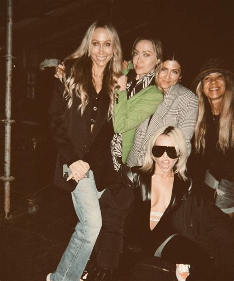 Group Of Women Posing For The Camera At Night