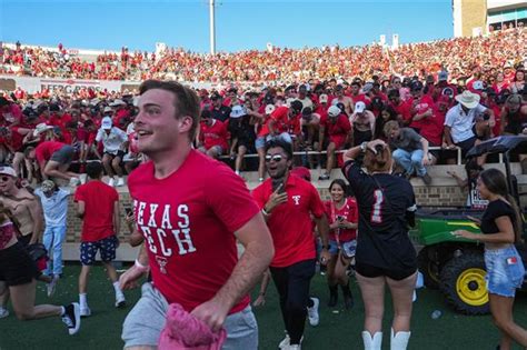 Video Emerges Of Texas Tech Student Blindsiding Texas Player During