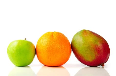 premium photo green apple orange and mango