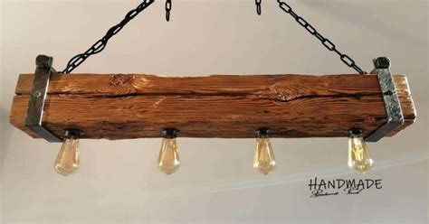 Zdjęcie nr w galerii treści Drewniana lampa żyrandol Retro Loft lat stara belka Rarytas