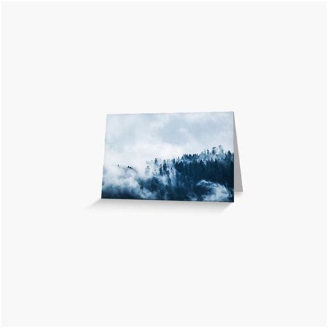 Green Pine Trees Covered With Fogs Under White Sky During Daytime