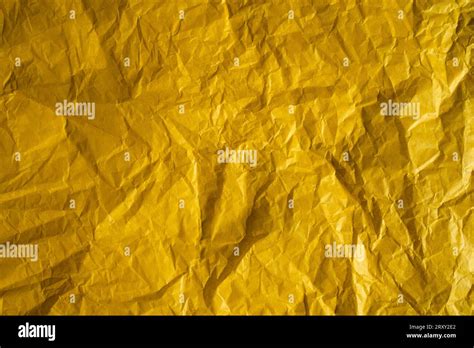 Yellow Crinkled Wrapping Paper With A Lot Of Texture Concept