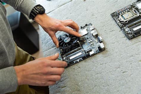 Minsk Belarus Dec 15 2021 Photo Of Hands Assembles A Computer Monitor System Block On An