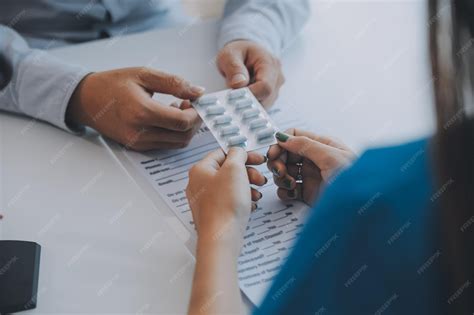 Premium Photo Doctor Uses Anatomical Model To Explain Male Urinary